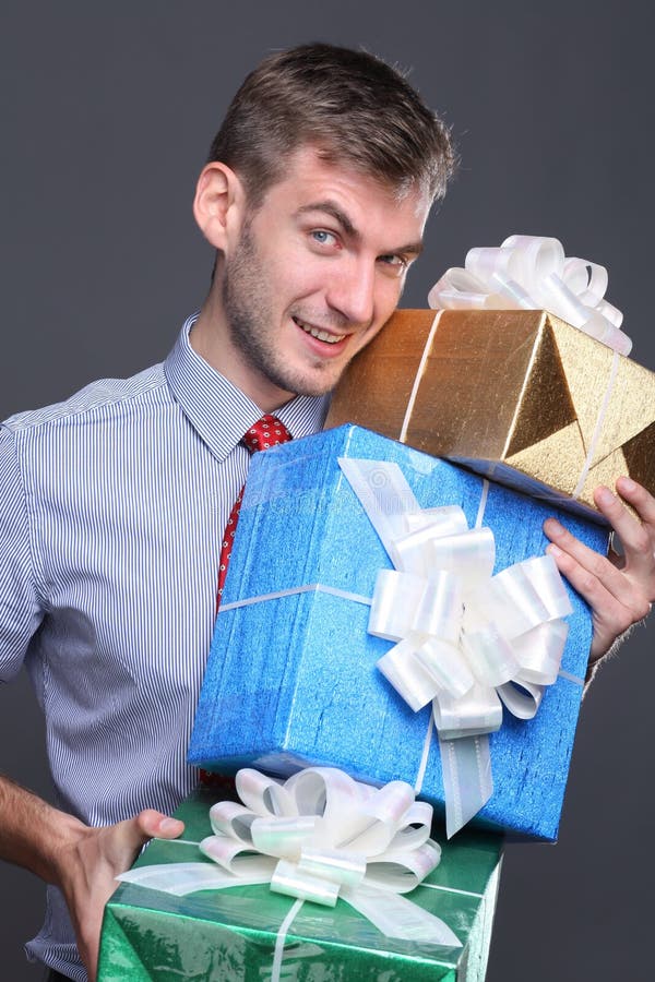 Young Business Man with Gifts Stock Photo - Image of businesspeople ...