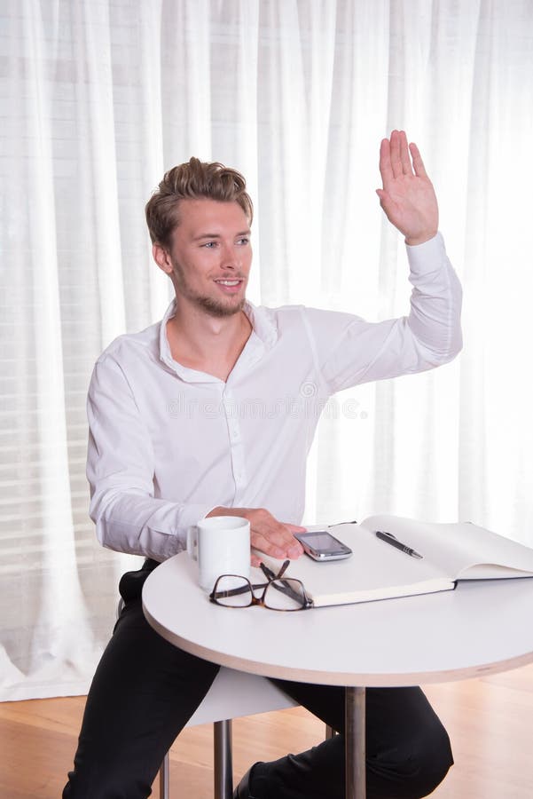 Young Business Man Greeting Someone Stock Image - Image of customer ...