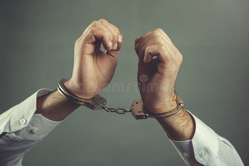 Man hand handcuffs stock photo. Image of thief, concept - 135378116