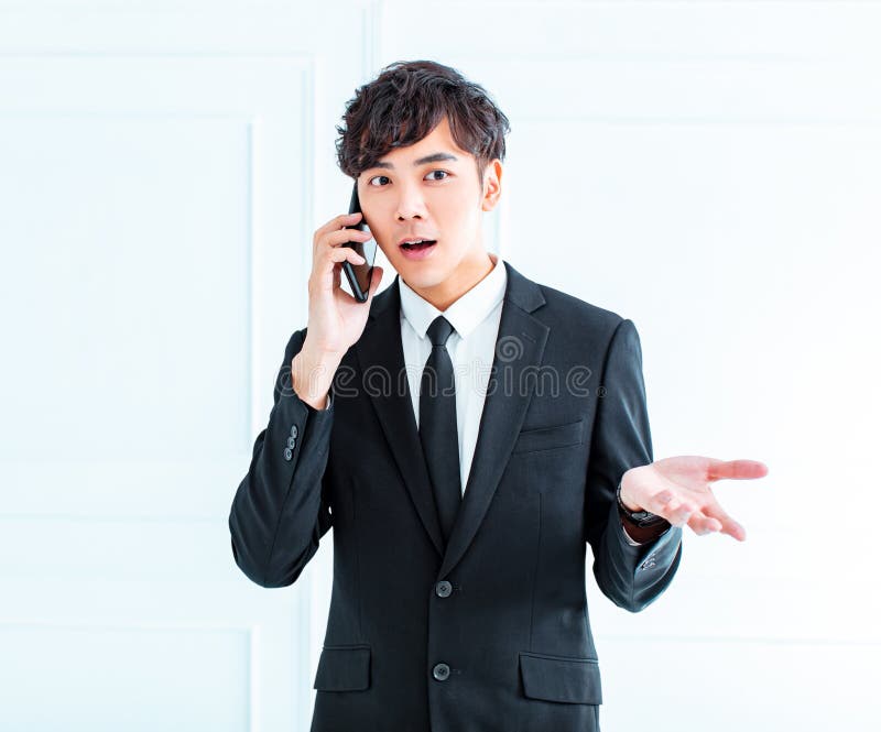 Young Business Man Making Phone Call with Smartphone Stock Photo ...