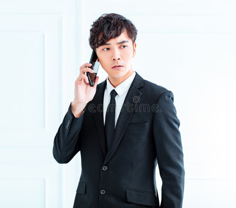 Young Business Man Making Phone Call with Smartphone Stock Photo ...