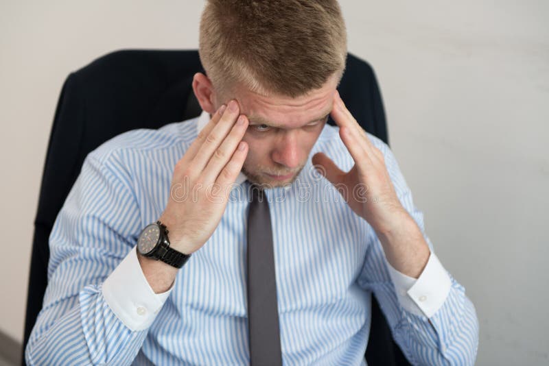 Young Business Man with Problems in the Office Stock Photo - Image of ...