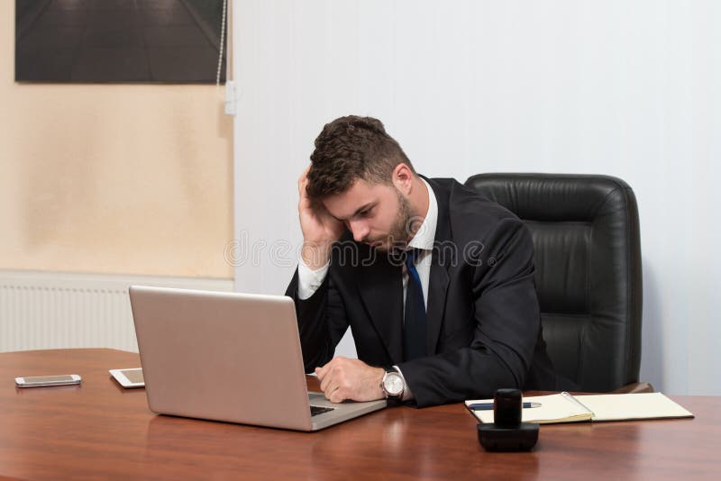 Young Business Man with Problems in the Office Stock Image - Image of ...