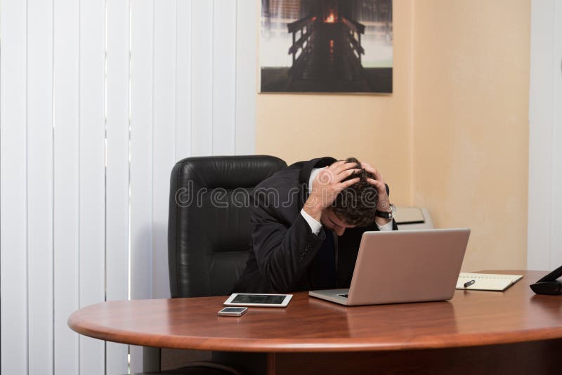 Young Business Man with Problems in the Office Stock Photo - Image of ...