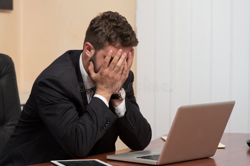 Young Business Man with Problems in the Office Stock Photo - Image of ...
