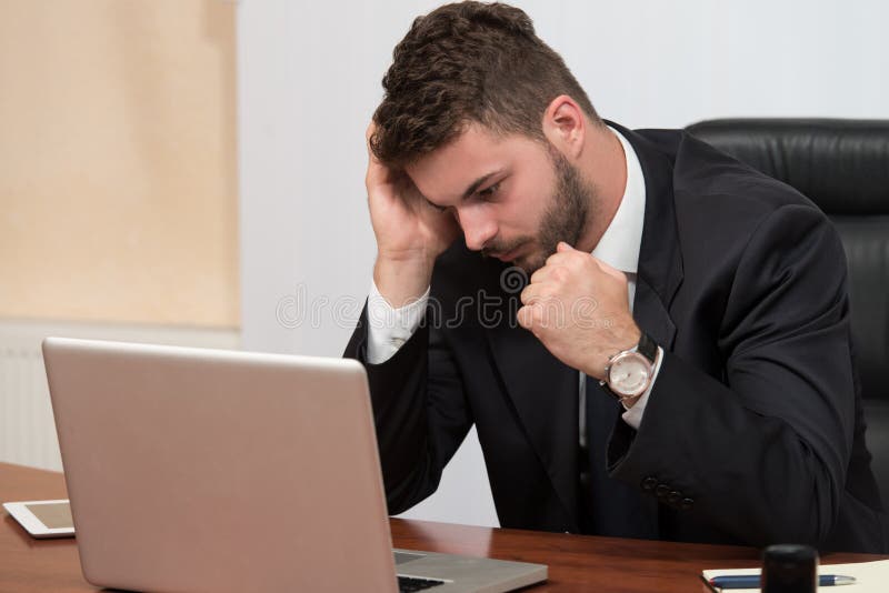 Young Business Man with Problems in the Office Stock Photo - Image of ...