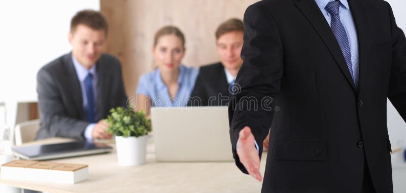 Young Business Man Ready To Handshake, Welcoming You Stock Image ...