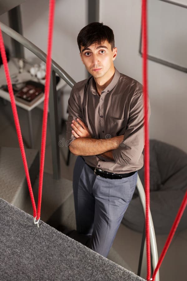 Young Business Man Standing on the Steps in Office Stock Image - Image ...
