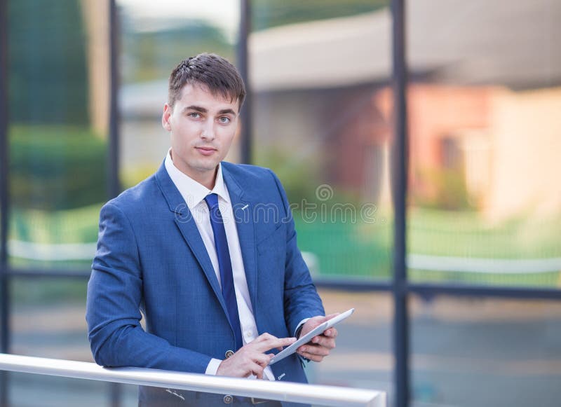 Young Business Man Think Look Up Hold Tablet Pc Stock Photo - Image of ...