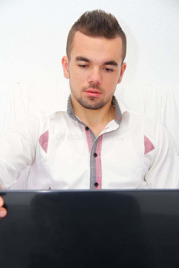 Young Business Man Using Laptop at Home Stock Photo - Image of leisure ...