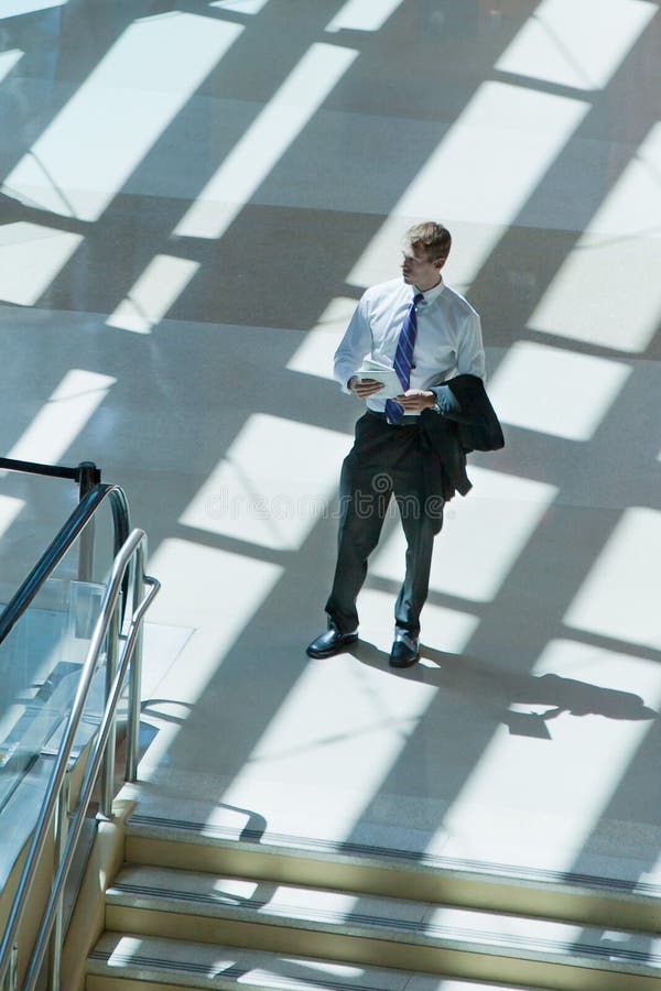Young Business Man Waiting in Lobby Stock Photo - Image of people ...