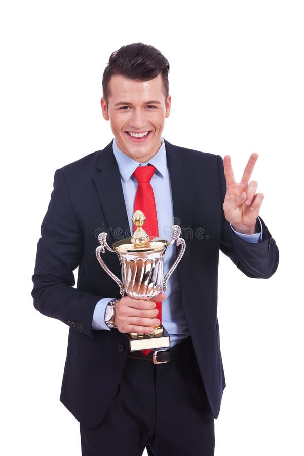 Young Business Man Winning a Big Trophy Stock Photo - Image of event ...