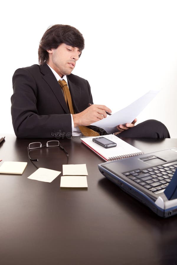 Young business man at work stock photo. Image of paper - 22825918
