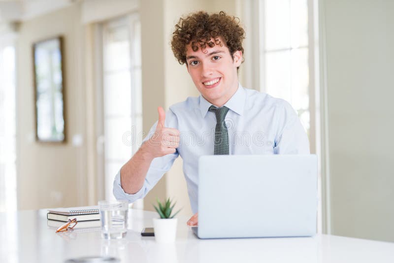 Young Business Man Working with Computer Laptop at the Office Doing ...