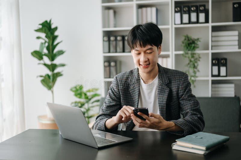 Young Business Man Working at Modern Office with Laptop, Tablet and ...