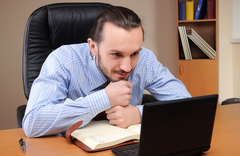 Young Business Man Working in an Office Stock Photo - Image of ...