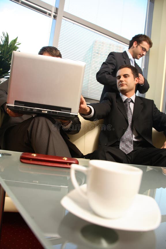 Young Business Men in Office Environment Stock Image - Image of ...