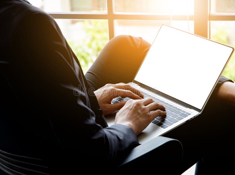 Young Business Men Sit and Work in the Office he Put the Laptop ...