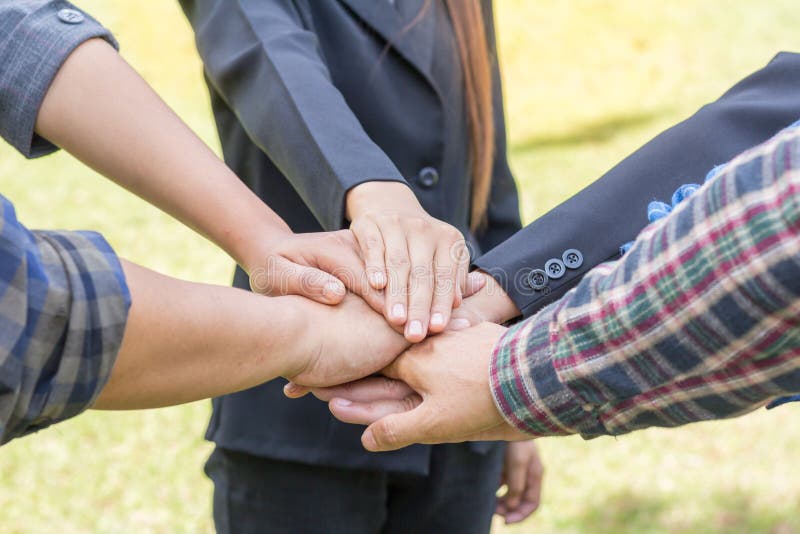 Young Business People Putting Their Hands Together. Stack of Han Stock ...