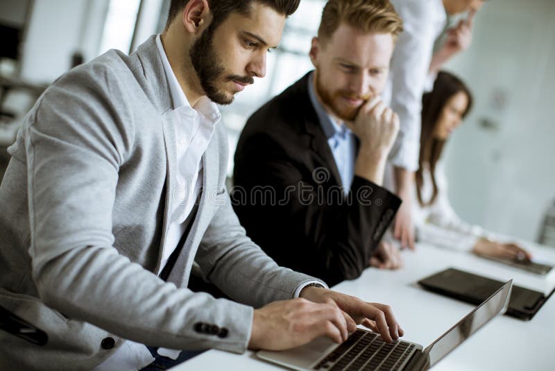 Young Business People Sharing Their Ideas in the Office Stock Image ...