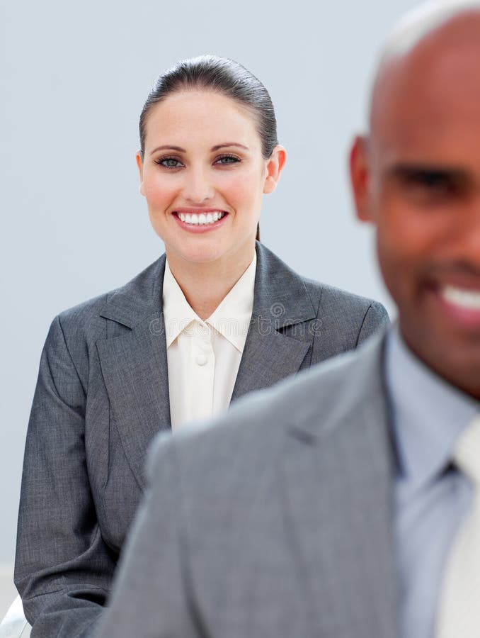 Young Business People Smiling Stock Photo - Image of company, assured ...