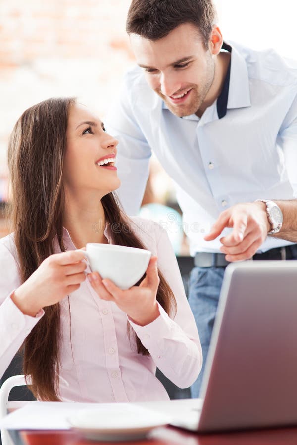 Business People Using Laptop at Cafe Stock Image - Image of laptop ...