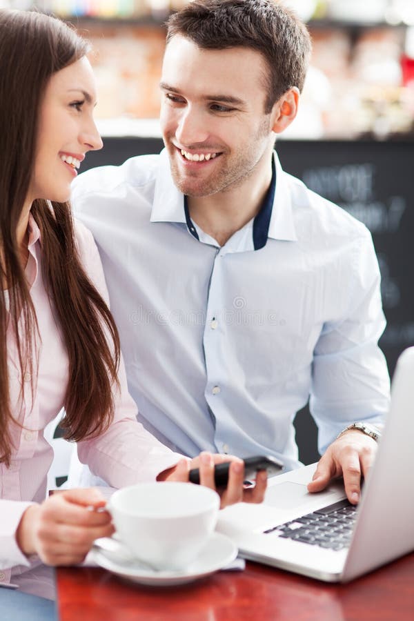 Business People Using Laptop at Cafe Stock Image - Image of internet ...