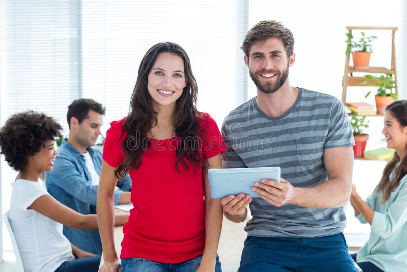 Young Business People Using a Tablet Stock Image - Image of coworkers ...