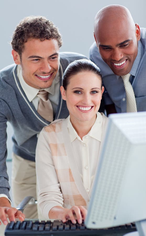 Young Business People Working at a Computer Stock Photo - Image of ...