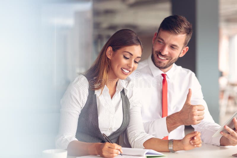 Young Business People Working Together on Computer Stock Image - Image ...