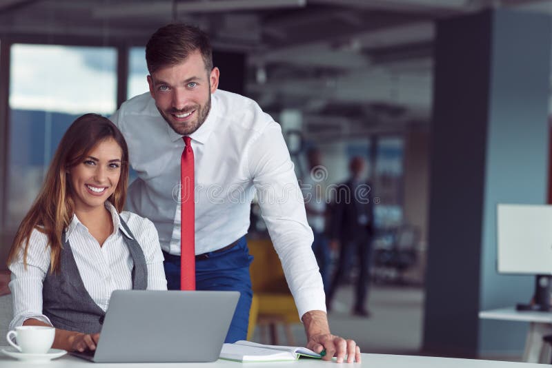 Young Business People Working Together on Computer Stock Image - Image ...