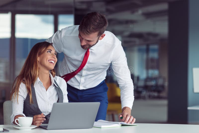 Young Business People Working Together on Computer Stock Photo - Image ...