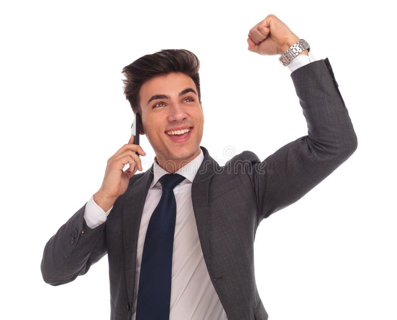 Young Business Talking on the Phone Celebrating Success Stock Photo ...