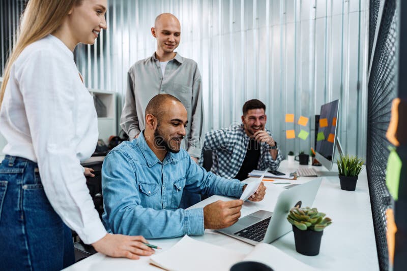 Young Business Team Working on a Project in Office. Stock Photo - Image ...