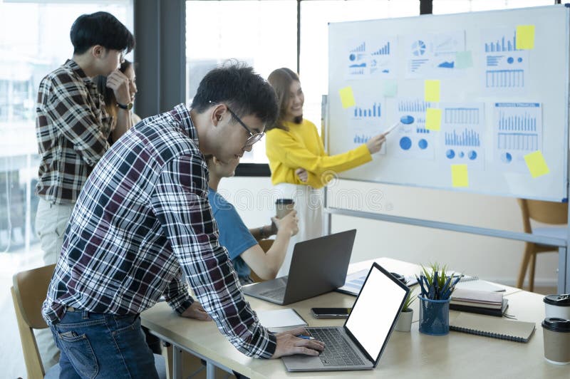 Young Business Team Working on Start Up Project Together at Bright ...