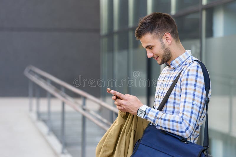 Young Business Traveler Using Cell Phone Stock Image - Image of fashion ...