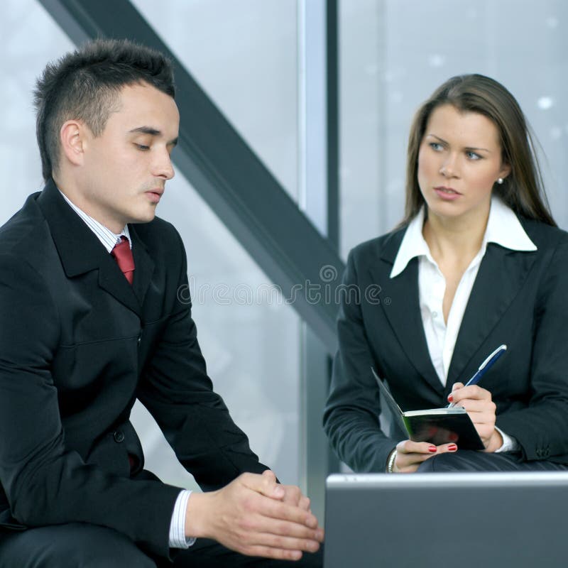 A Young Business Woman Interviews a Man Stock Image - Image of ...