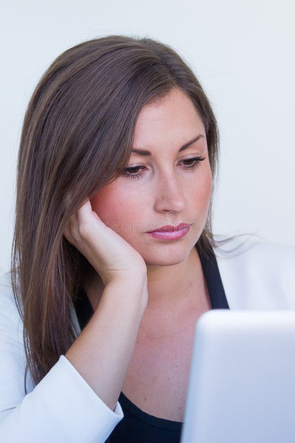 Young Business Woman Looking a Bit Tired at the Computer Stock Image ...
