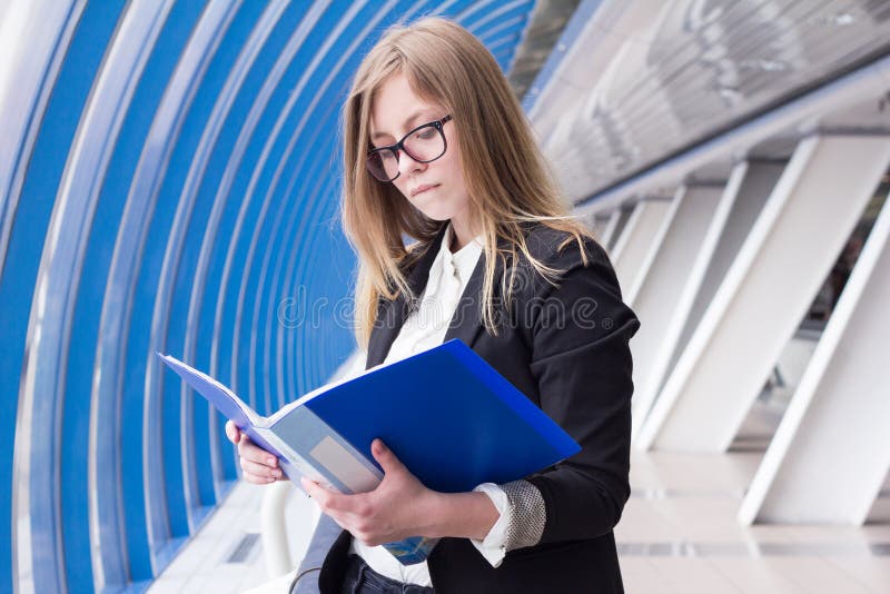 Young Business Woman Reading Documents Folder Stock Image - Image of ...
