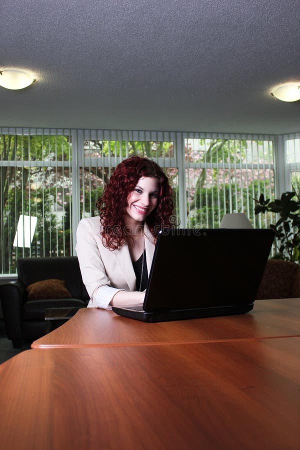 Young Business Woman at Work with Laptop Computer Stock Photo - Image ...