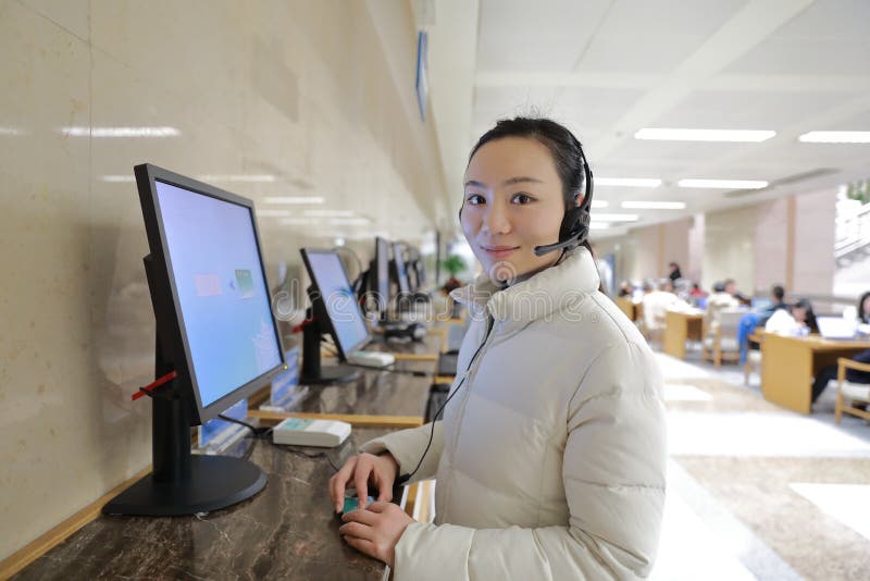 Young Girl at Helpdesk at Shanghai Library Stock Image - Image of ...