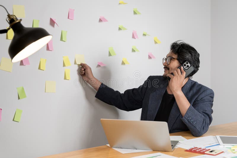 Young Business Workers Posting with Sticky Notes Stickers Reminders ...