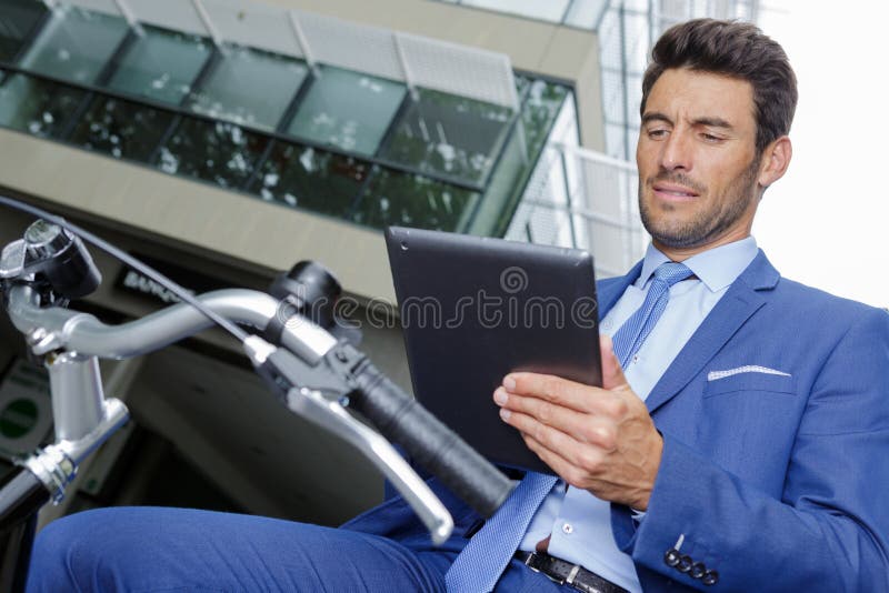 545 Businessman Checking His Tablet Stock Photos - Free & Royalty-Free ...