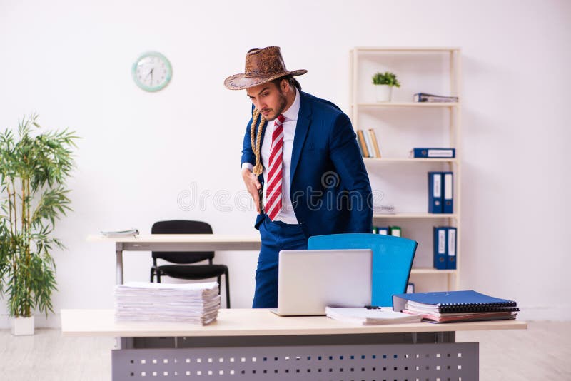 Young Businessman Cowboy Working in the Office Stock Photo - Image of ...