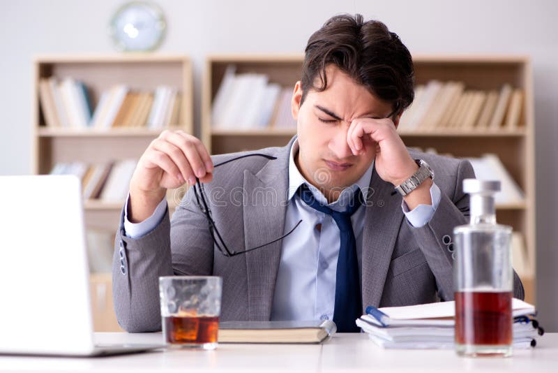 The Young Businessman Drinking from Stress Stock Image - Image of ...