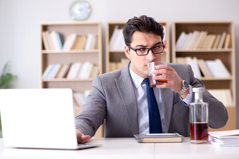 The Young Businessman Drinking from Stress Stock Photo - Image of ...