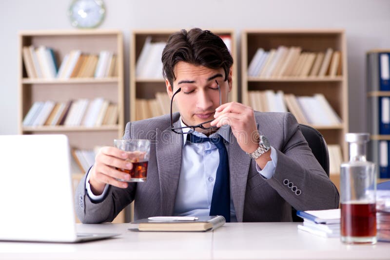The Young Businessman Drinking from Stress Stock Image - Image of ...