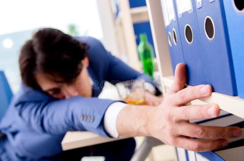 Young Businessman Employee Drinking in the Office Stock Image - Image ...