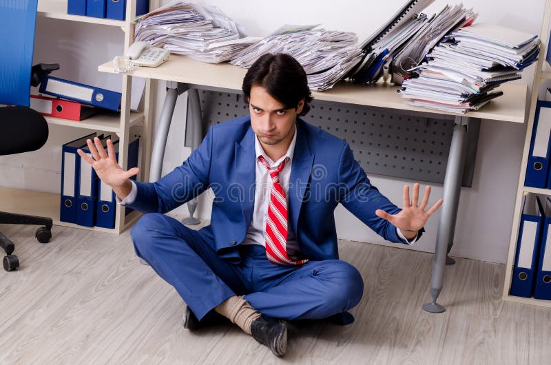 The Young Businessman Employee Unhappy with Excessive Work Stock Image ...