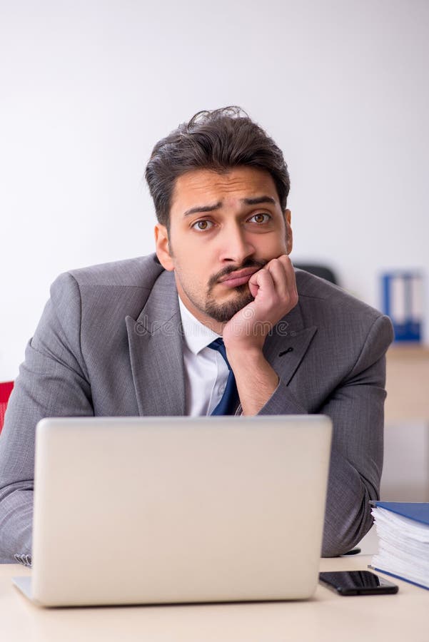 Young Male Employee Working in the Office Stock Image - Image of busy ... Young Male Employee Working in the Office Stock Image - Image of busy ...